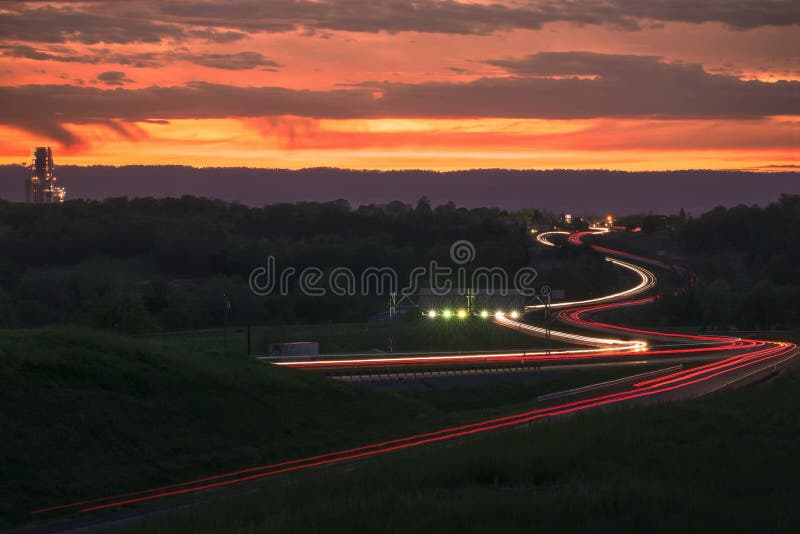 Long Exposure of the Highway Captured at Mesmerizing Sunset Stock Photo ...