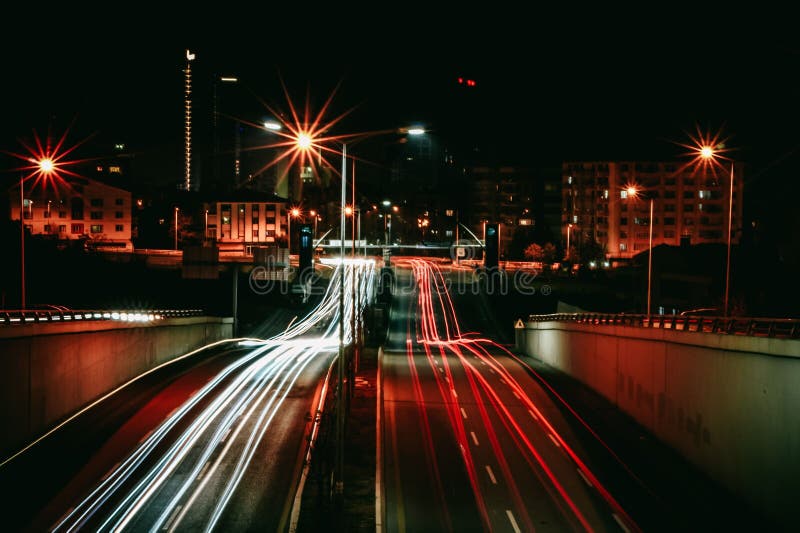 Long-exposure of Illuminated Freeway Surrounded by Skyscrapers at Night ...