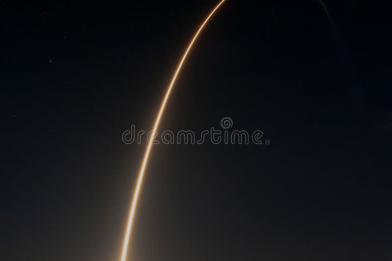 Rocket Launch Arc Over Cape Canaveral Night Sky Stock Photo - Image of ...