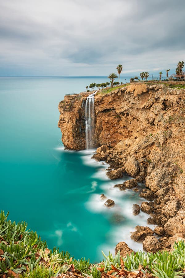 Long Exposure Image of the Waterfall Falling from the Cliffs into the ...
