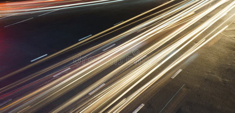 Long Exposure Light Trails Across Road Junction Stock Photo - Image of ...