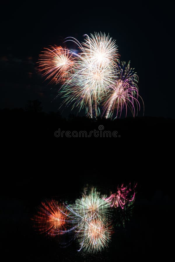 Fireworks with Reflections stock image. Image of display - 20255737