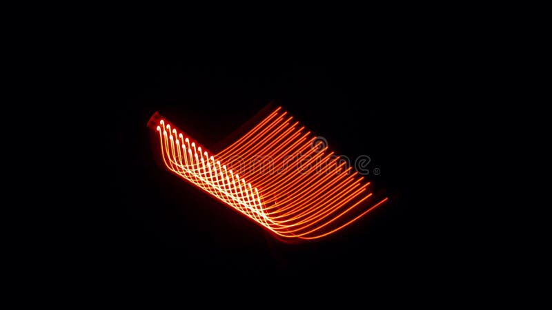 Long Exposure of Orange Light Stripes Isolated on a Black Background ...