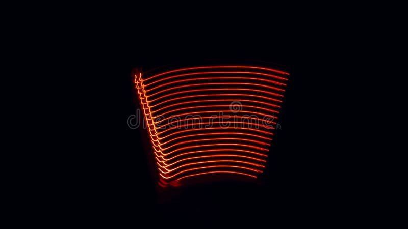 Long Exposure of Orange Light Stripes Isolated on a Black Background ...