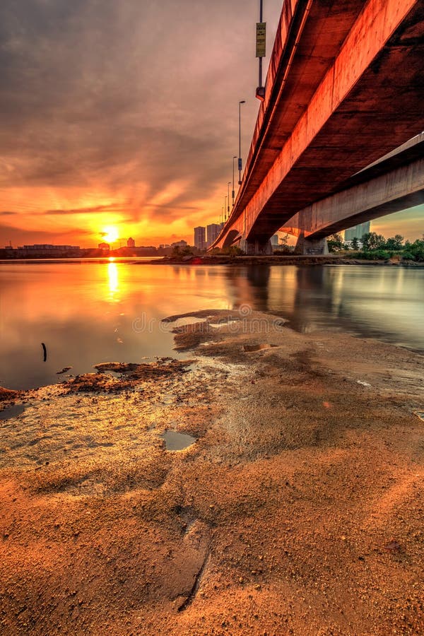A Long Exposure Picture of Beautiful Burning Sunset Under the Br Stock ...