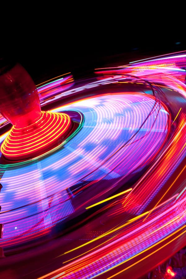 Long Exposure Picture of a Fairground Ride at Night Stock Photo - Image ...