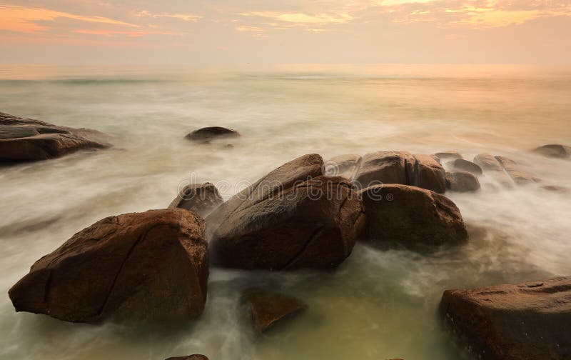 Long Exposure of Sea and Rock in Evening. Stock Photo - Image of dawn ...
