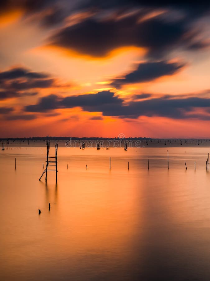 Long Exposure Shot of a Beautiful Sunset at Lake Stock Image - Image of ...