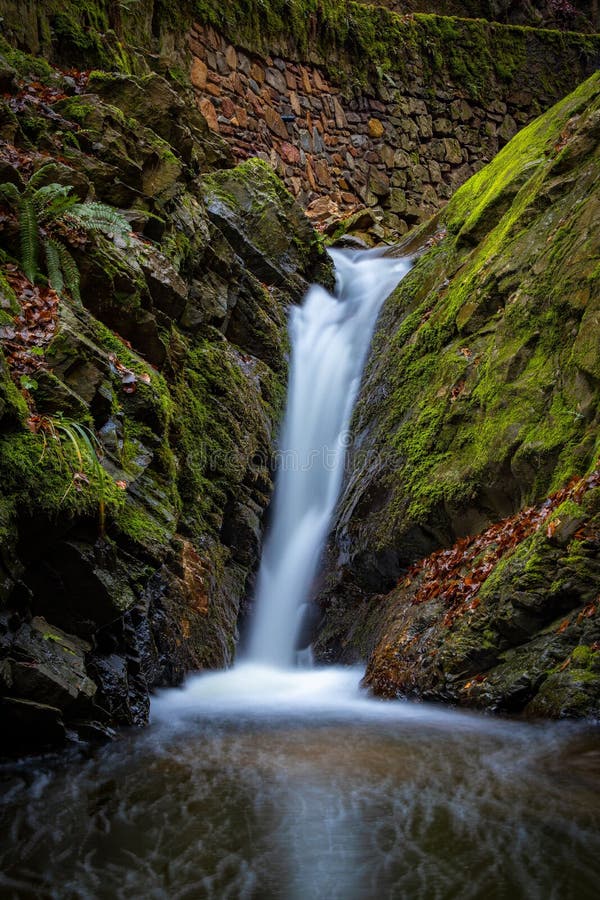 Long Exposure Shot of a Beautiful Waterfall with Moss Rocks Stock Image ...