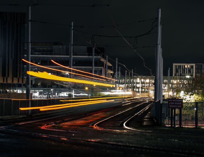 Long Exposure Shot of the Light Trails of the Train Over the Railway ...
