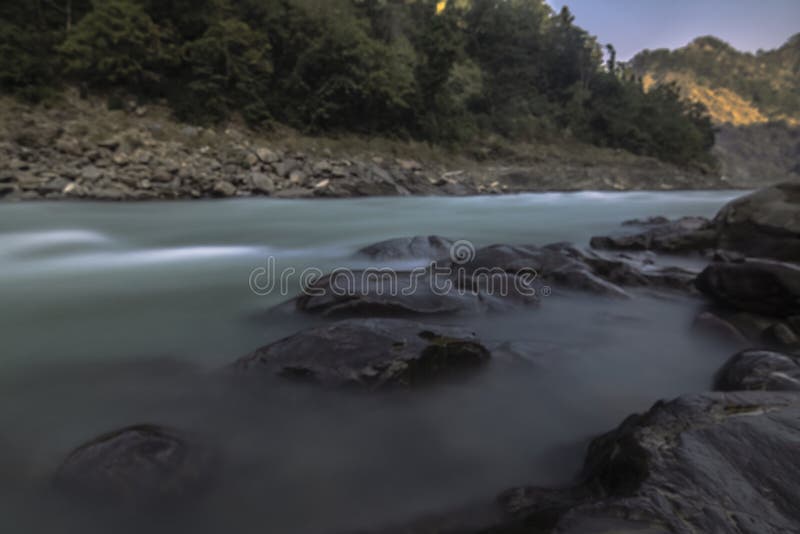Long-Exposure Shot of River Rafting Site and Its Landscape on River ...