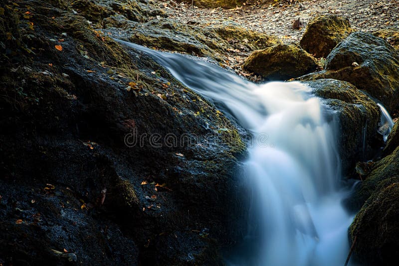 Long Exposure Shot of the Rocky Cascading Waterfall Stock Image - Image ...