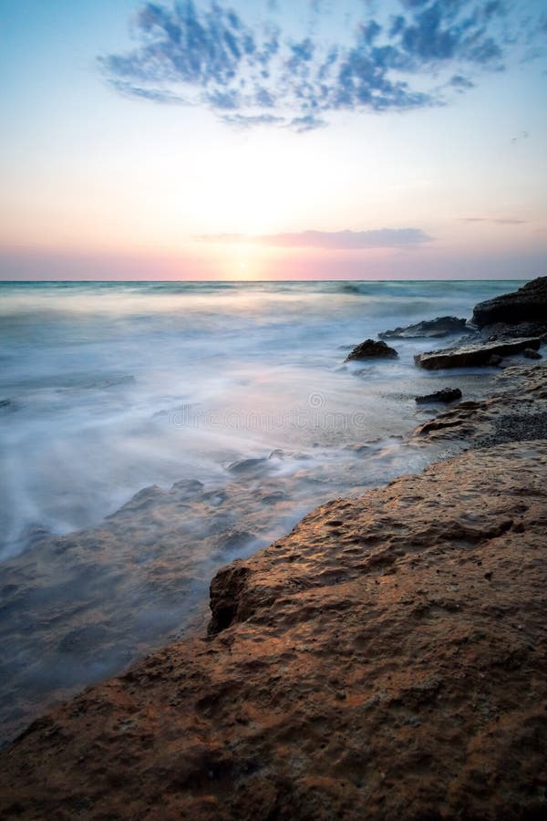 A Long Exposure Shot of the Surf at Sunset Stock Image - Image of ...