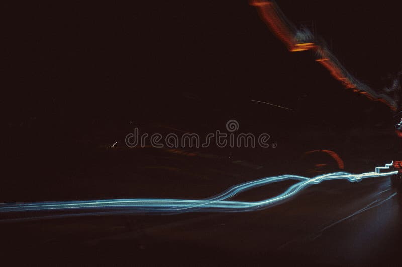 Long Exposure Shot of Trails of Lights on a Dark Background Stock Image ...