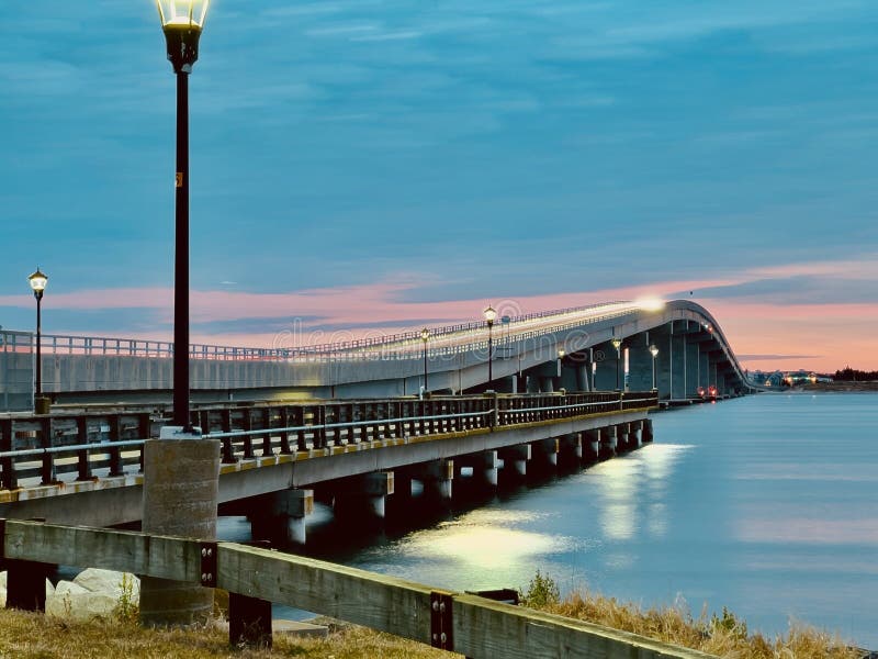 Long Exposure of a Long, Sleek Bridge Seeing at Sunset Stock Photo ...