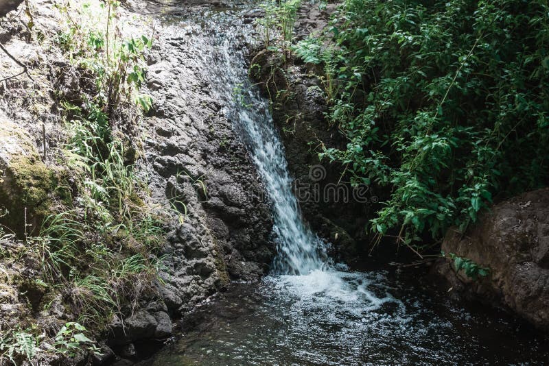 Long Exposure of a Small Waterfall Running Down in Spain Flowing ...