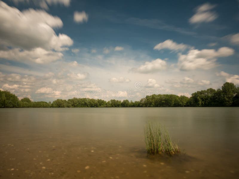 Long Exposure on a Sunny Day at the Lake Stock Image - Image of ...