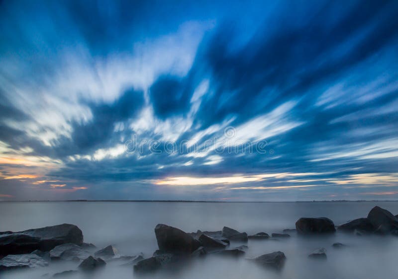 Long Exposure Sunset stock image. Image of pier, rocks - 64897975