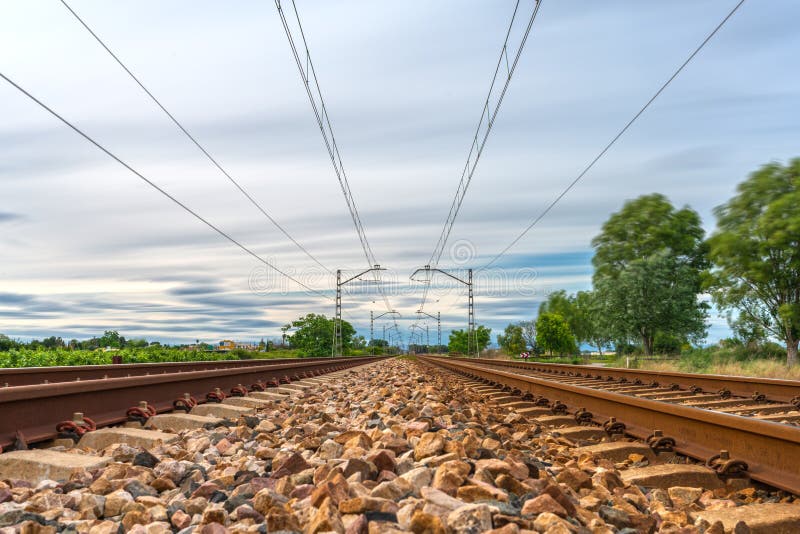 Long Exposure of Track and Power Cables, Bottom View Stock Photo ...