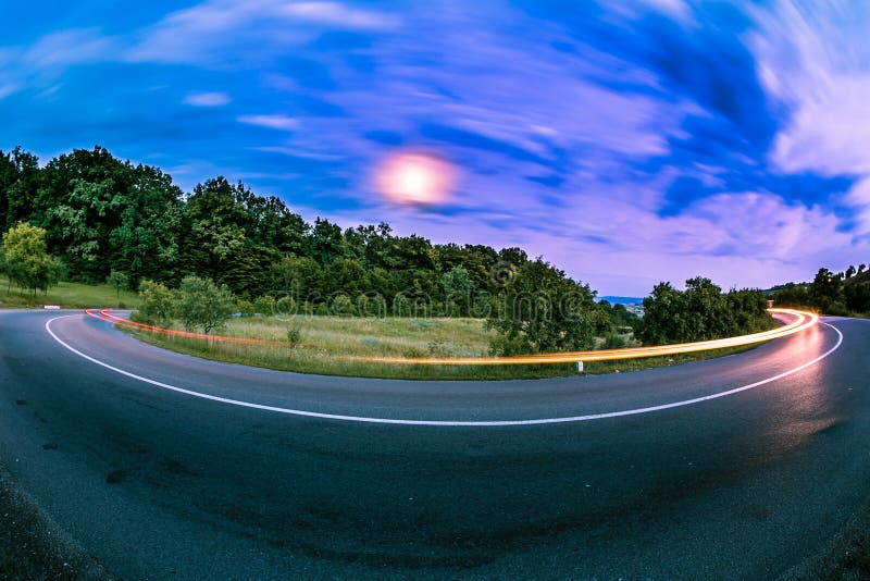 A long exposure u turn stock image. Image of road, blue - 251725493
