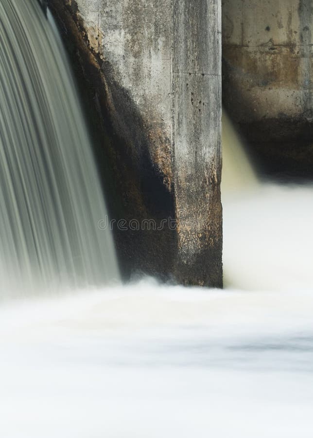 Long Exposure of Water Flowing Over a Hydroelectric Dam Stock Photo ...