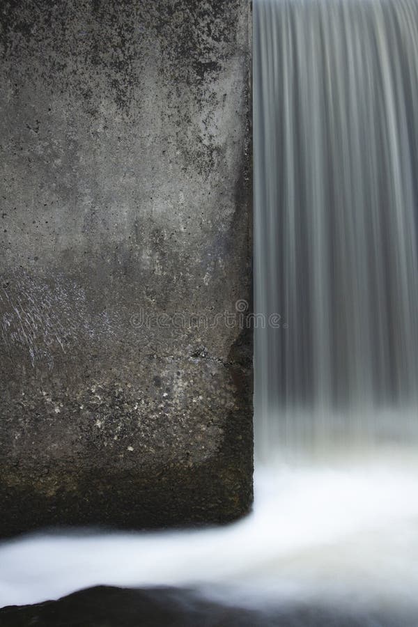 Long Exposure of Water Flowing Over a Hydroelectric Dam Stock Image ...