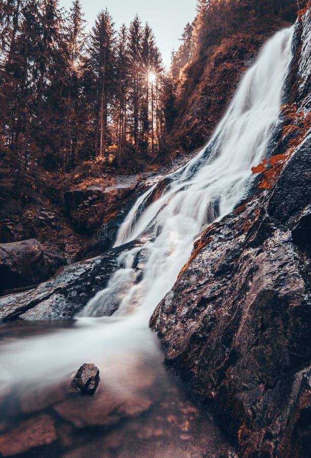 Long Exposure of a Waterfall in an Autumn Forest Stock Image - Image of ...