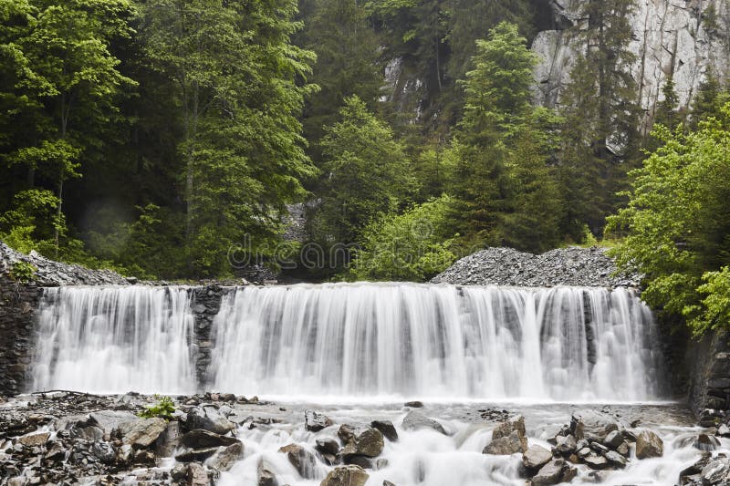 Long Exposure Waterfall in Forest Stock Photo - Image of churning ...