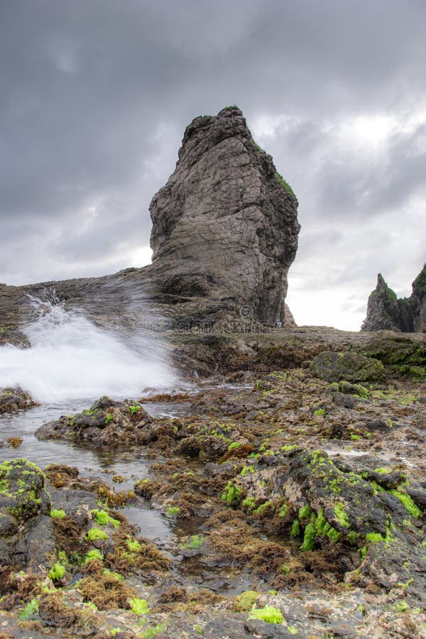 Long Exposure of Waves Crashed the Rocks at a Beach Stock Photo - Image ...