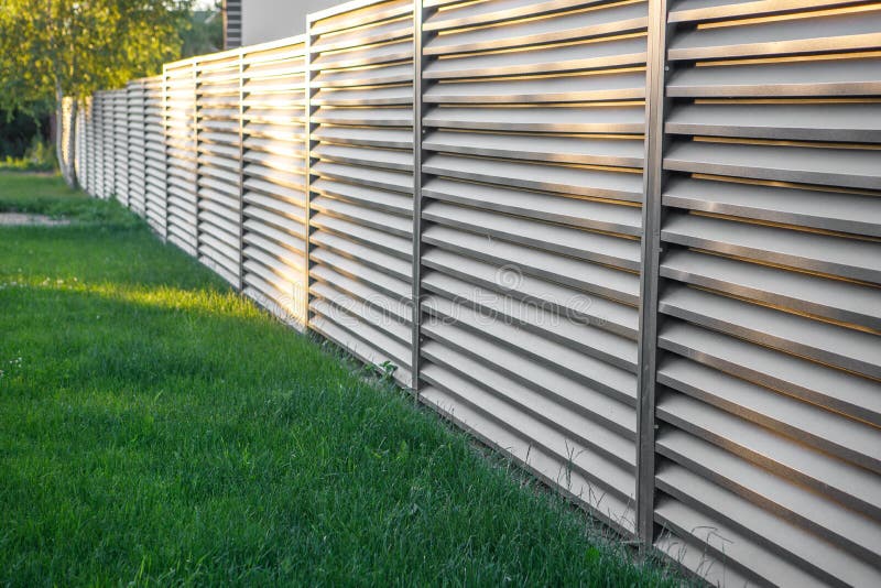 A Long Fence Along the Plot. Fenced Territory Stock Image - Image of ...