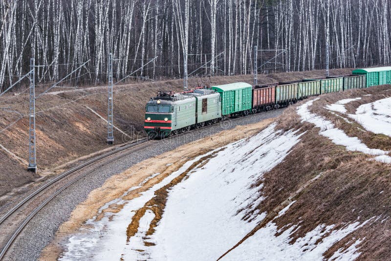 Long Freight Train Approaches Stock Image - Image of transportation ...