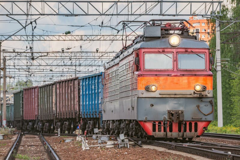 Long Freight Train Approaches Stock Photo - Image of forwarding ...