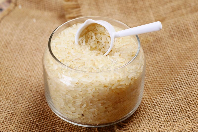 Long Grain Rice in a Bowl on Table Stock Photo - Image of large ...