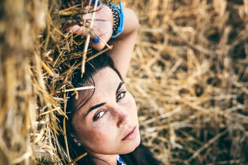 Long Hair Girl Relaxing on the Hay Stack Stock Photo - Image of freedom ...