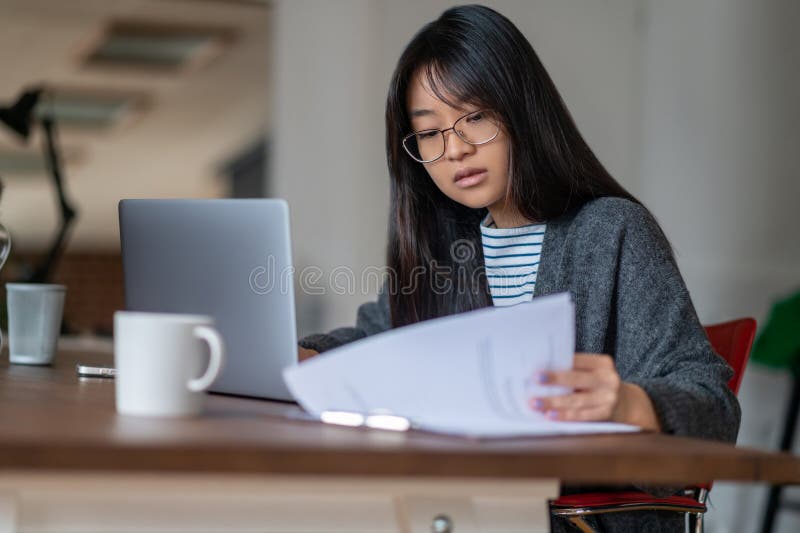 Long-haired Asian Young Woman Working in Her Home Office Stock Photo ...
