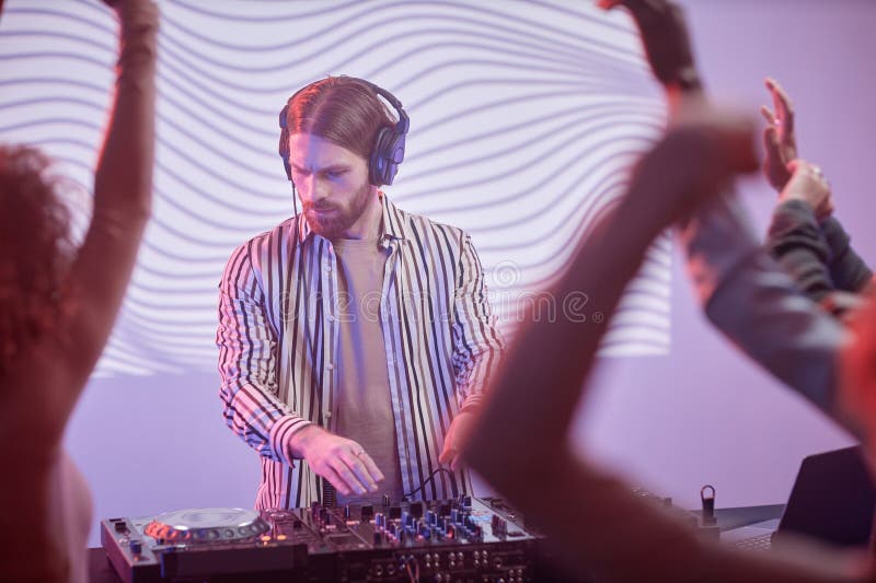 Long Haired DJ by Turntable in Neon Lights Stock Image - Image of mixer ...