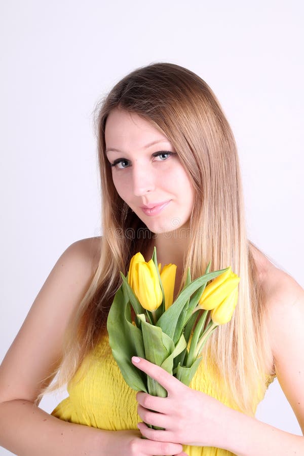Long-haired Romantic Girl with Yellow Tulips Stock Image - Image of ...