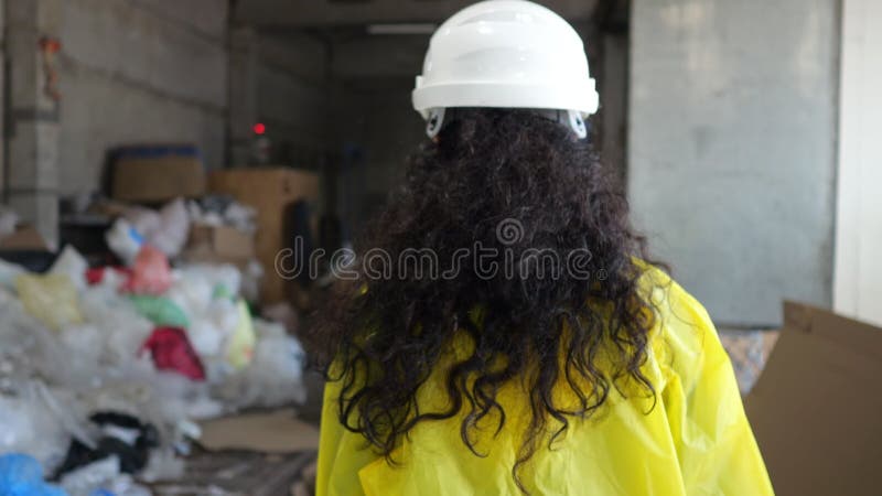 Long-haired Supervisor Walks about Waste Sorting Plant Stock Footage ...