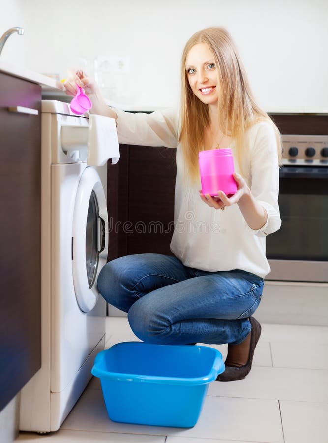 Long-haired Woman Doing Laundry with Detergent Stock Image - Image of ...