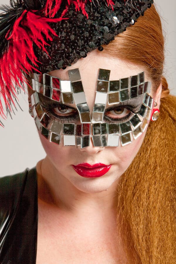 Long haired woman in mask stock photo. Image of feather - 11499244