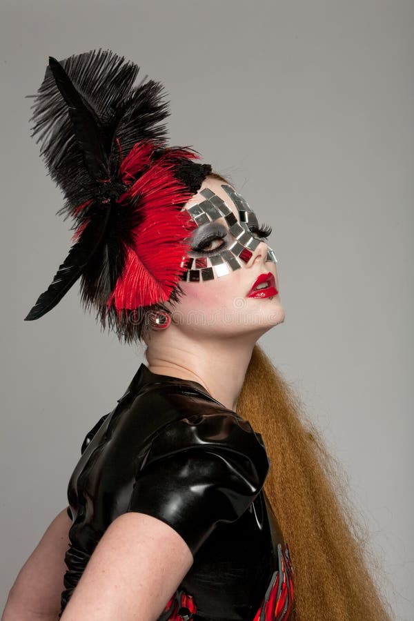 Long haired woman in mask stock photo. Image of feather - 11499244