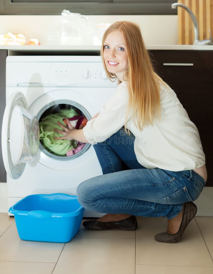 Long-haired Woman Using Washing Machine at Home Stock Image - Image of ...