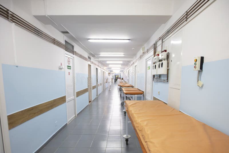 Long hospital corridor stock image. Image of doctor - 261699327