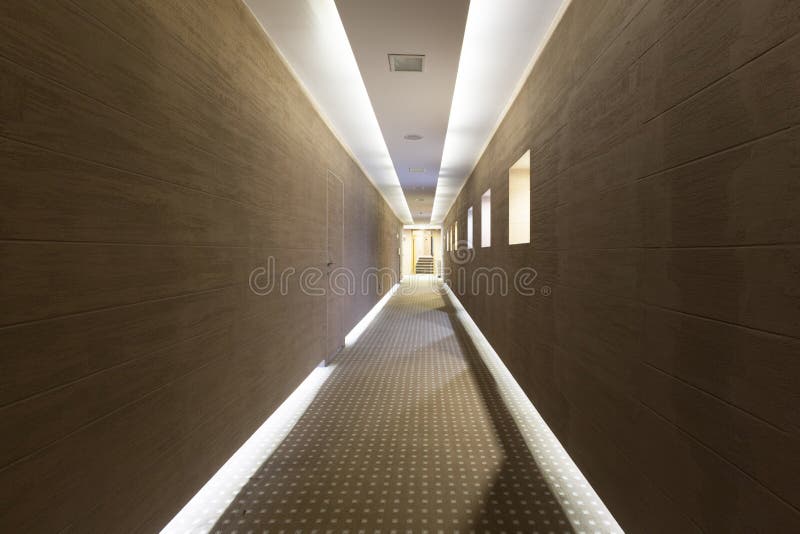 Long Hotel Corridor with Modern Floor and Ceiling Lights Stock Photo ...