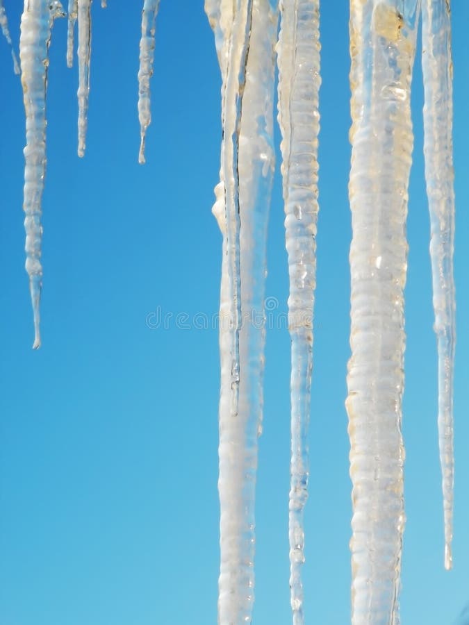 Long Icicles on a Background of the Sky Stock Image - Image of frost ...
