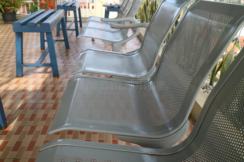 Long Iron Seat on the Floor Stock Image - Image of client, green: 249068673