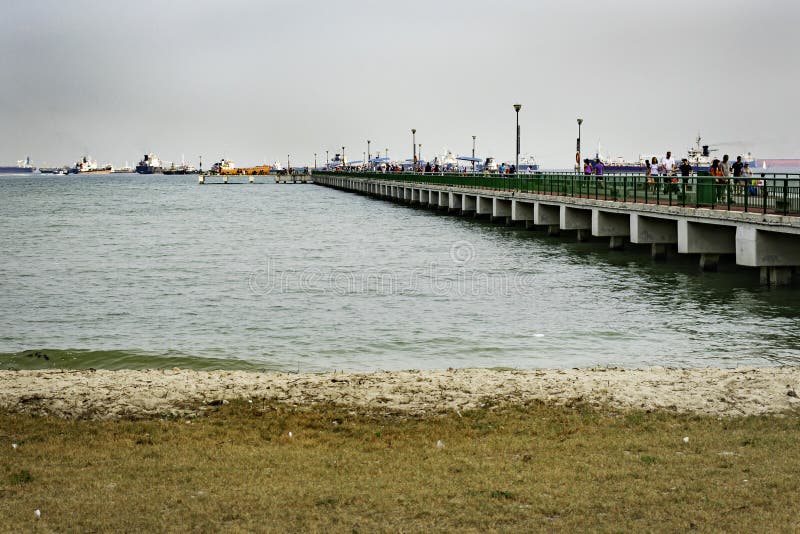 Long jetty at the beach stock photo. Image of jetty - 168823390