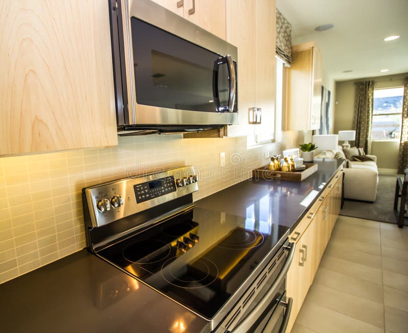 Long Kitchen Counter with Back Splash Stock Photo - Image of floor ...