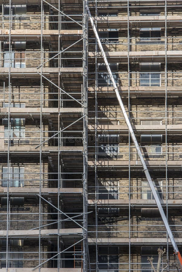 Long ladder on scaffolding stock photo. Image of levels - 49705182