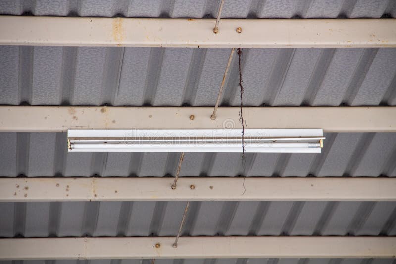 The Long Lamp that is Attached Above the Terrace is Made of Steel Frame ...